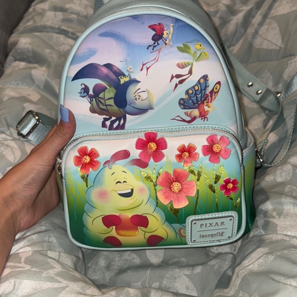 Pixar | Bags | Pixar Loungefly Colorful Backpack | Poshmark